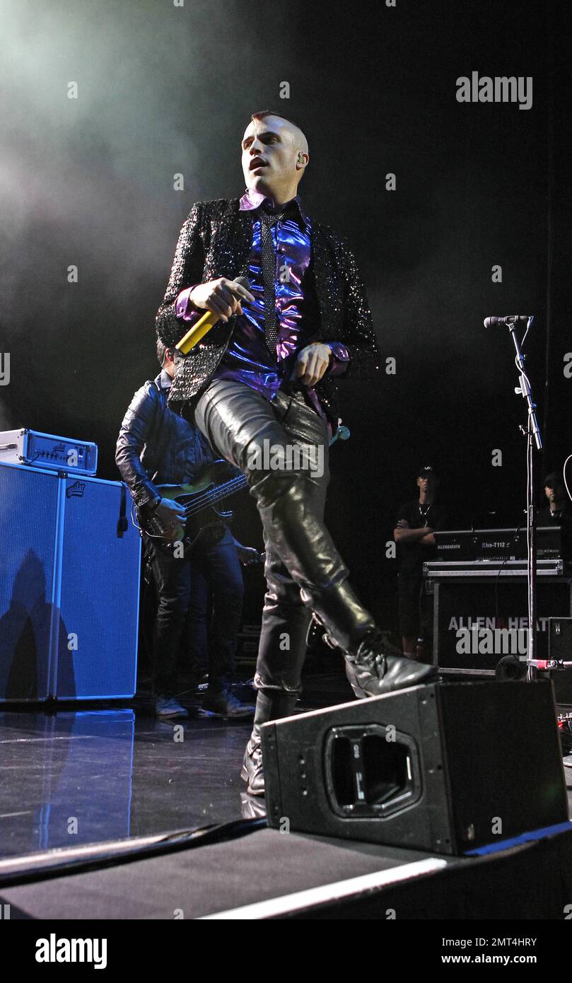 'Neon Tree's' lead vocalist Tyler Glenn performs with the rest of the ...