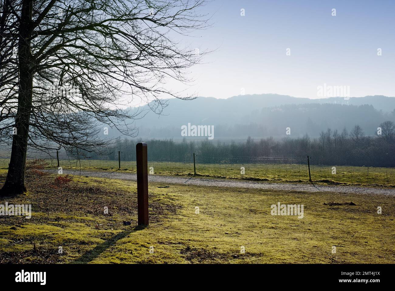 Lowland - Rebild National Park. A dirt road through lowland heath ...