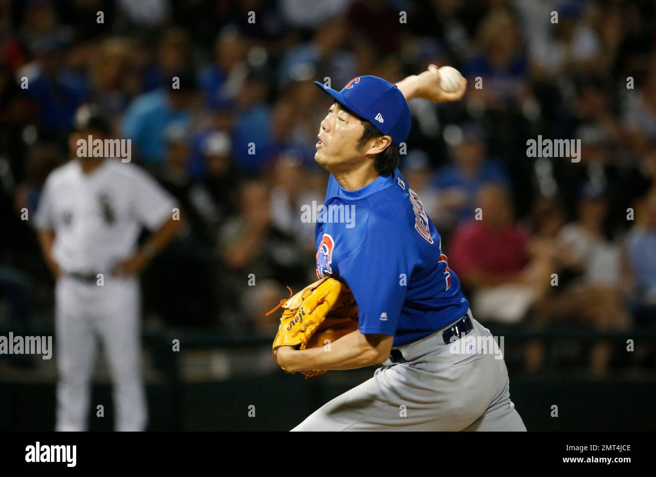 Chicago Cubs relief pitcher Koji Uehara delivers during the ninth ...