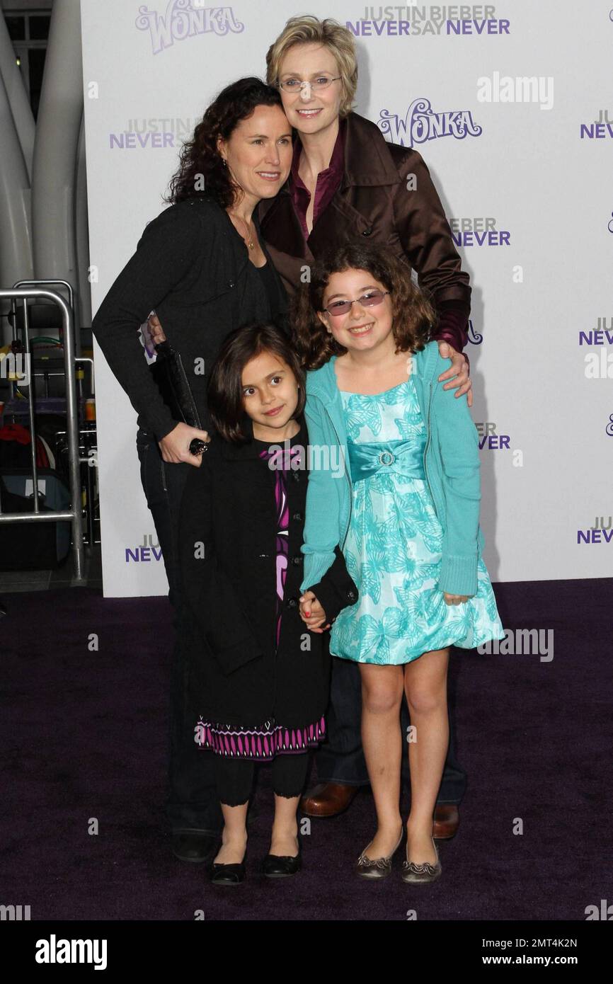 Jane Lynch with her step children and wife Dr. Lara Embry at the ...
