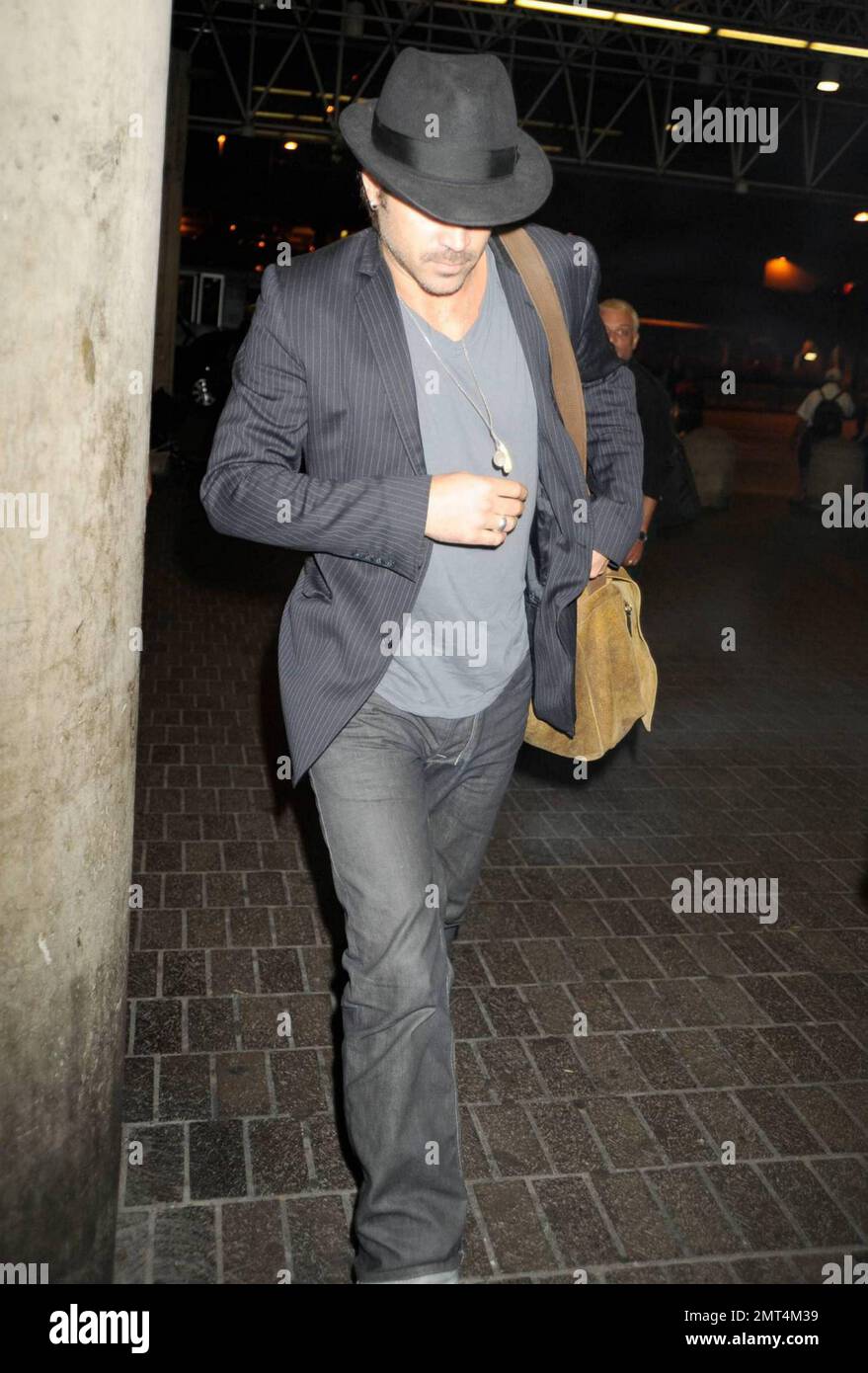 New dad for the second time, actor Colin Farrell arrives at LAX to ...