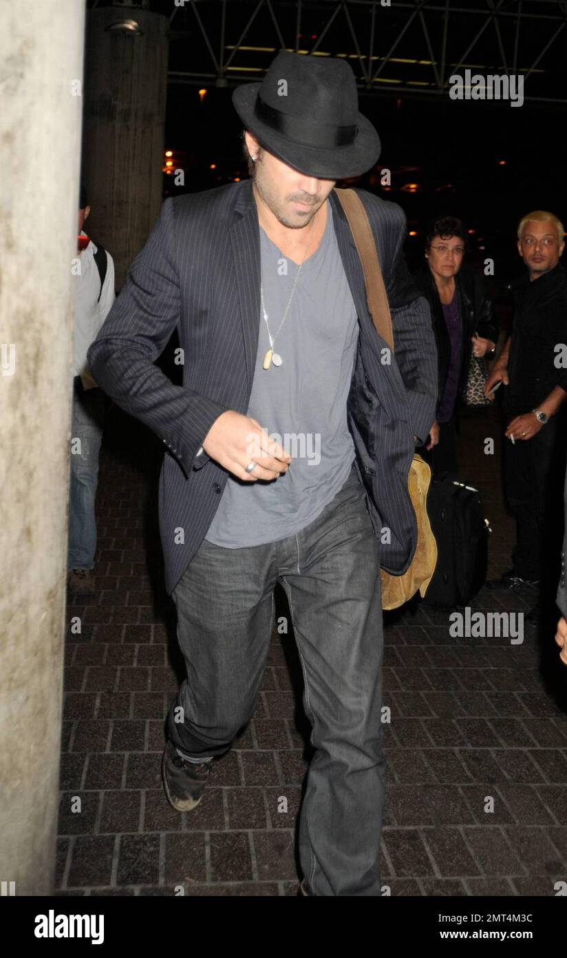 New dad for the second time, actor Colin Farrell arrives at LAX to ...