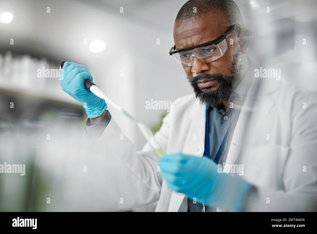 Scientist man, thinking or test tubes in laboratory pharma, medical ...