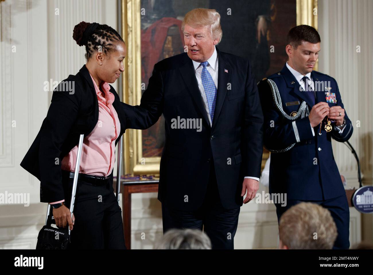 Capitol Hill police officer Crystal Griner is greeted by President ...