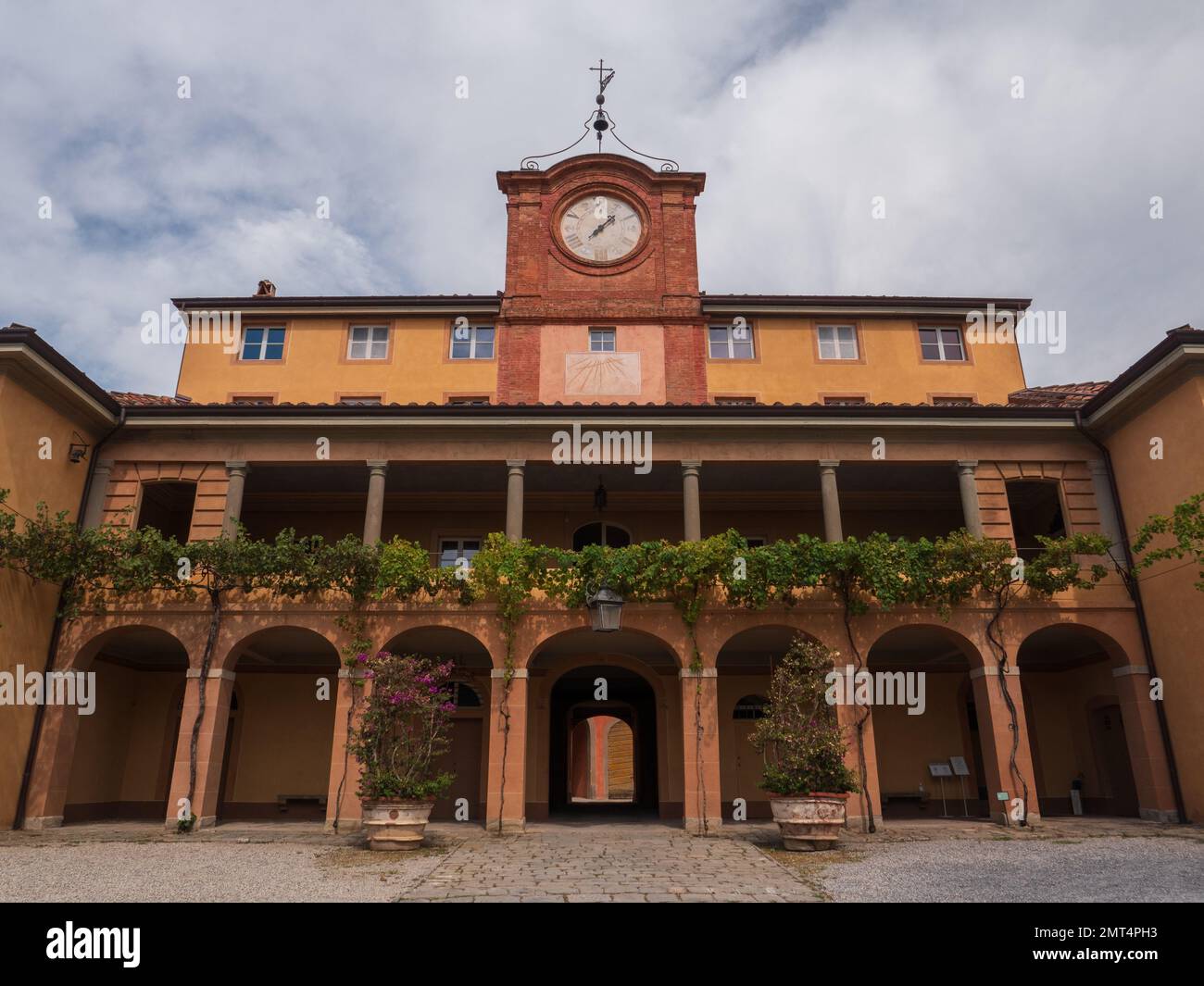 The clock topped building in the grounds of Villa Reale di Marlia ...