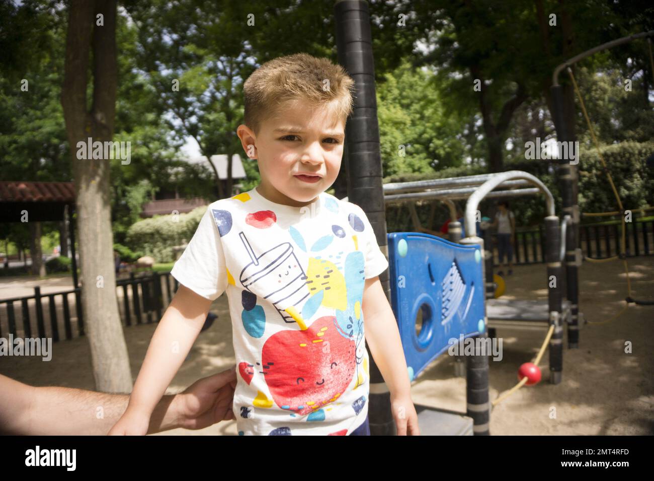 Four year old boy playing in a playground. Summer day Stock Photo - Alamy