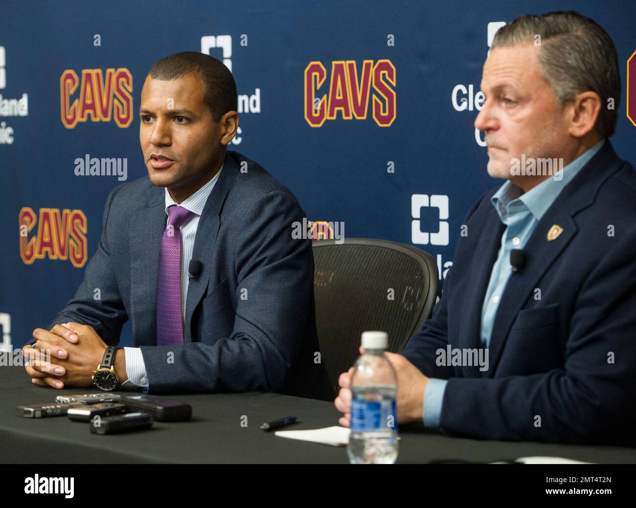 New Cleveland Cavaliers general manager Koby Altman, left, answers a ...