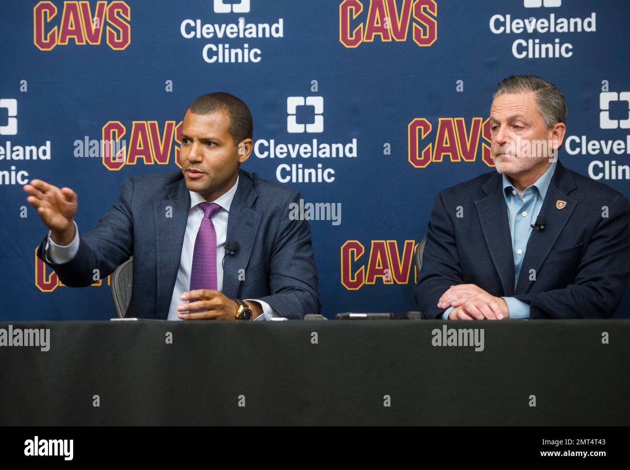 New Cleveland Cavaliers general manager Koby Altman, left, answers a ...