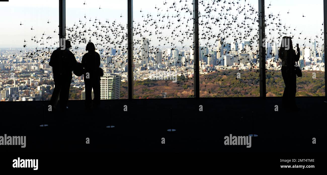 Tourist enjoying the views from the the Scramble Square building in ...