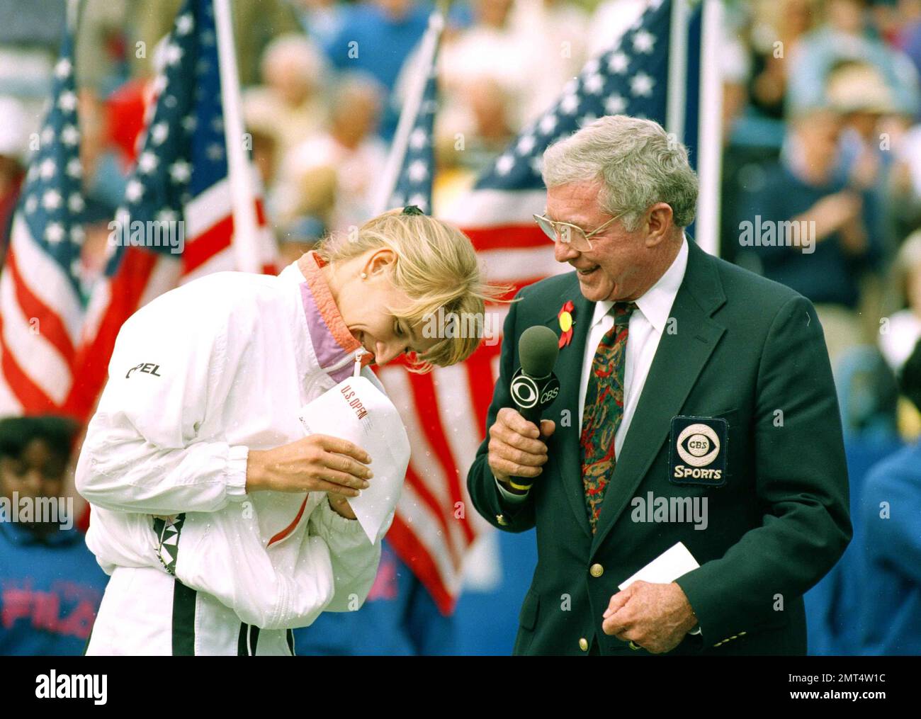 Germany's Steffi Graf peeks at her check after winning the women's ...