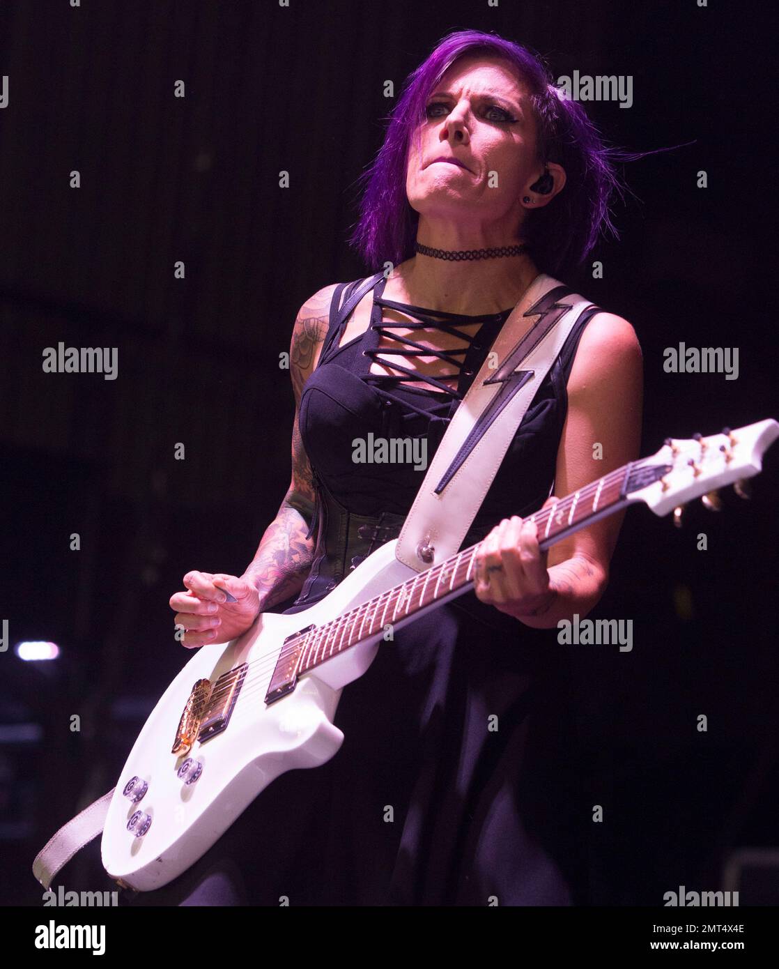 Korey Cooper of the band Skillet performs in concert as the opening act ...
