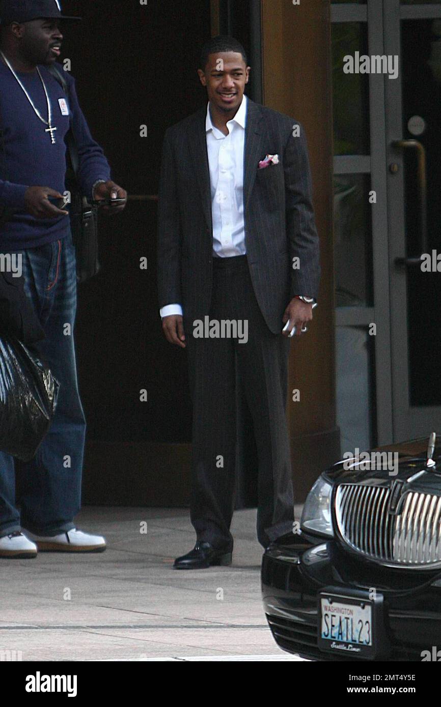 Exclusive!! Nick Cannon looks snappy wearing a pinstriped suit as he ...