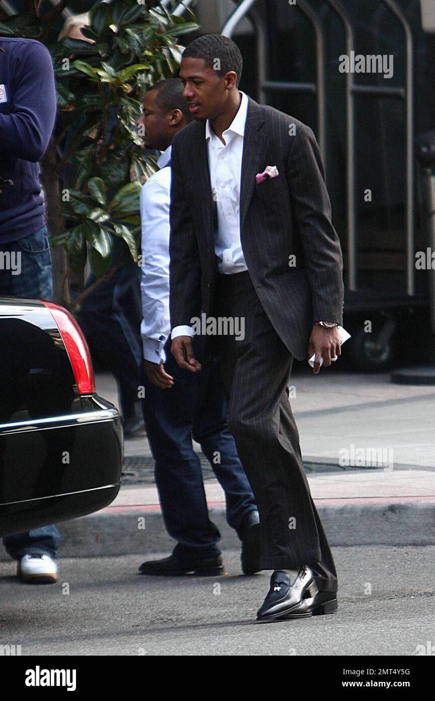 Exclusive!! Nick Cannon looks snappy wearing a pinstriped suit as he ...