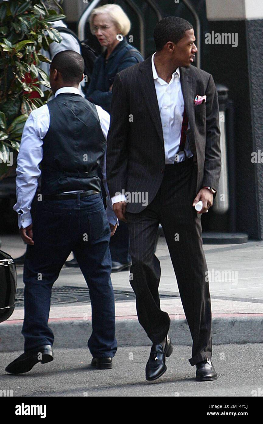 Exclusive!! Nick Cannon looks snappy wearing a pinstriped suit as he ...