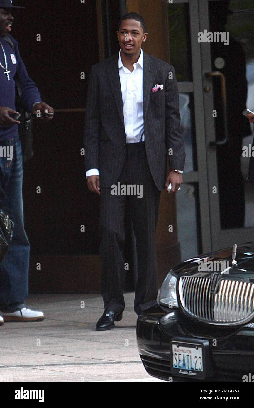 Exclusive!! Nick Cannon looks snappy wearing a pinstriped suit as he ...