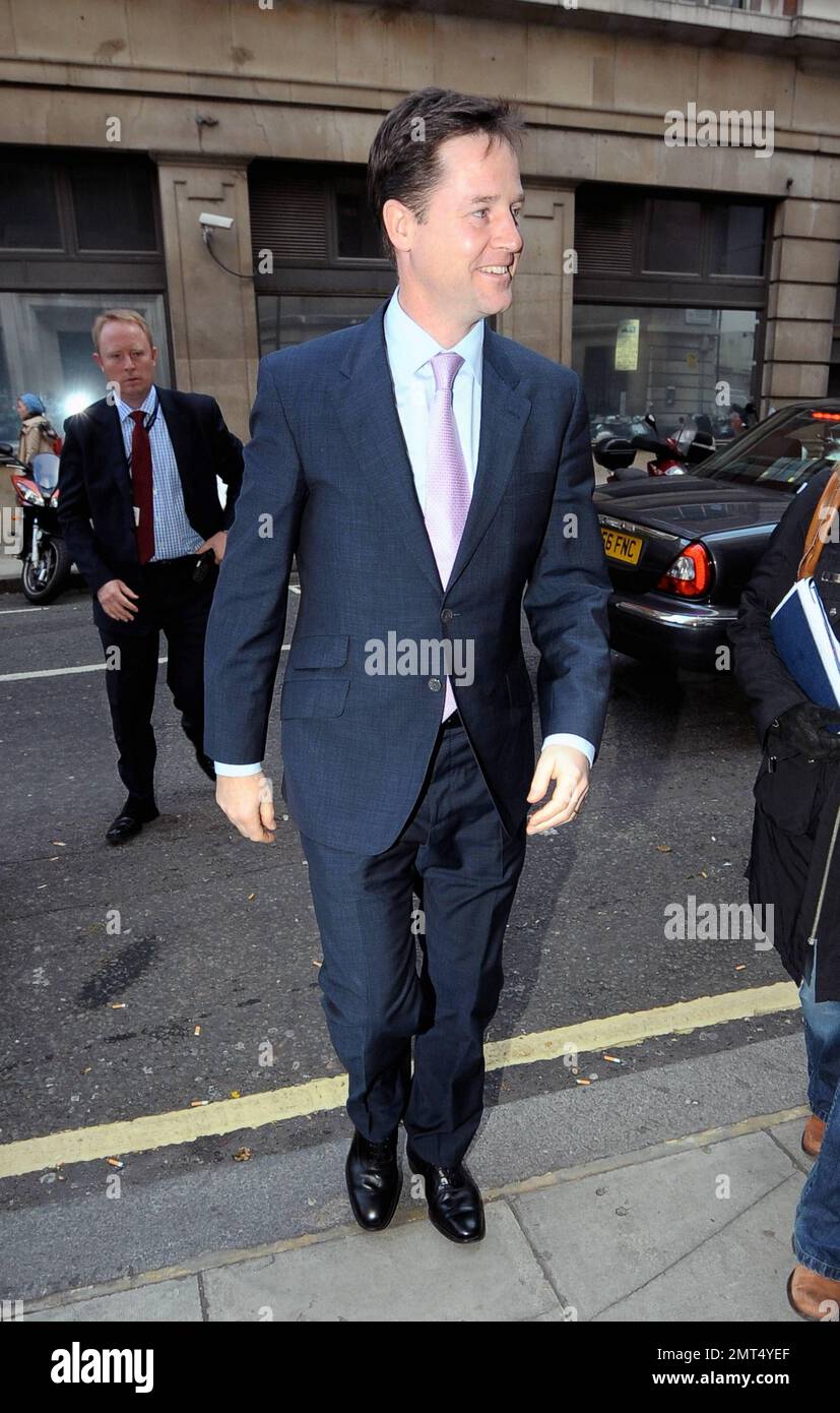 UK Deputy Prime Minister Nick Clegg is all smiles as he arrives for an ...