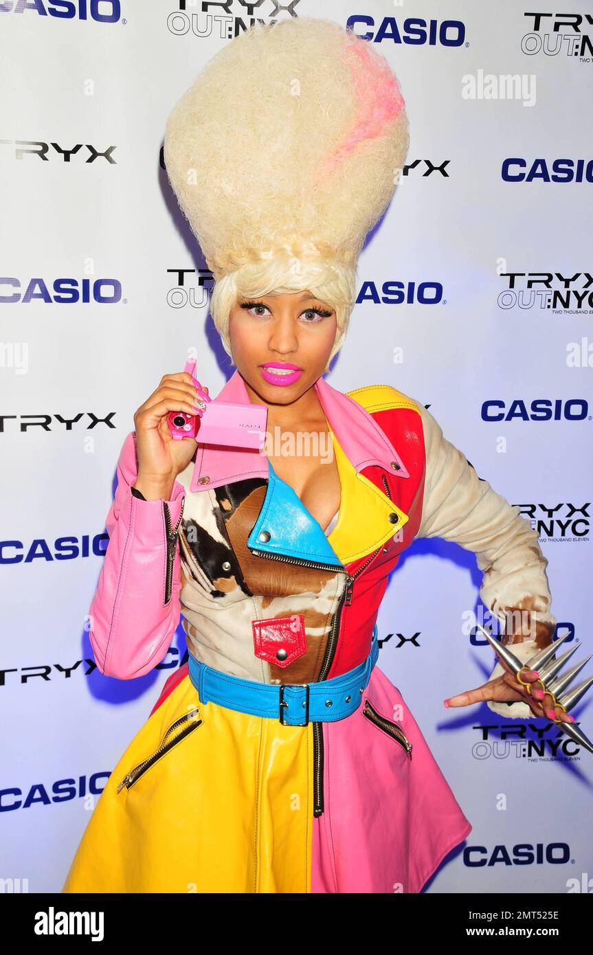 Hip hop and R&B singer Nicki Minaj wears a wild outfit of a bust ...