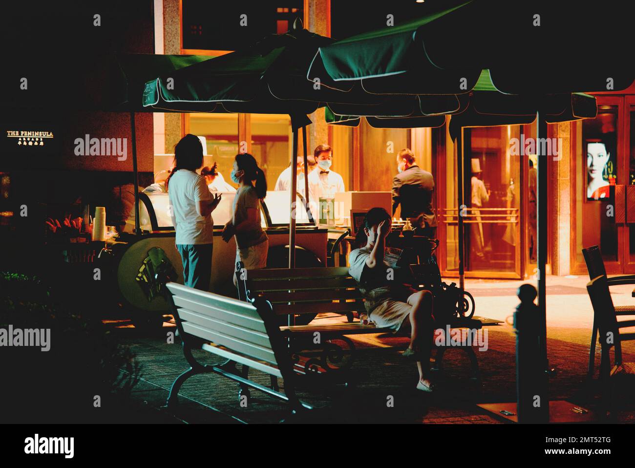 A night street with people Stock Photo - Alamy