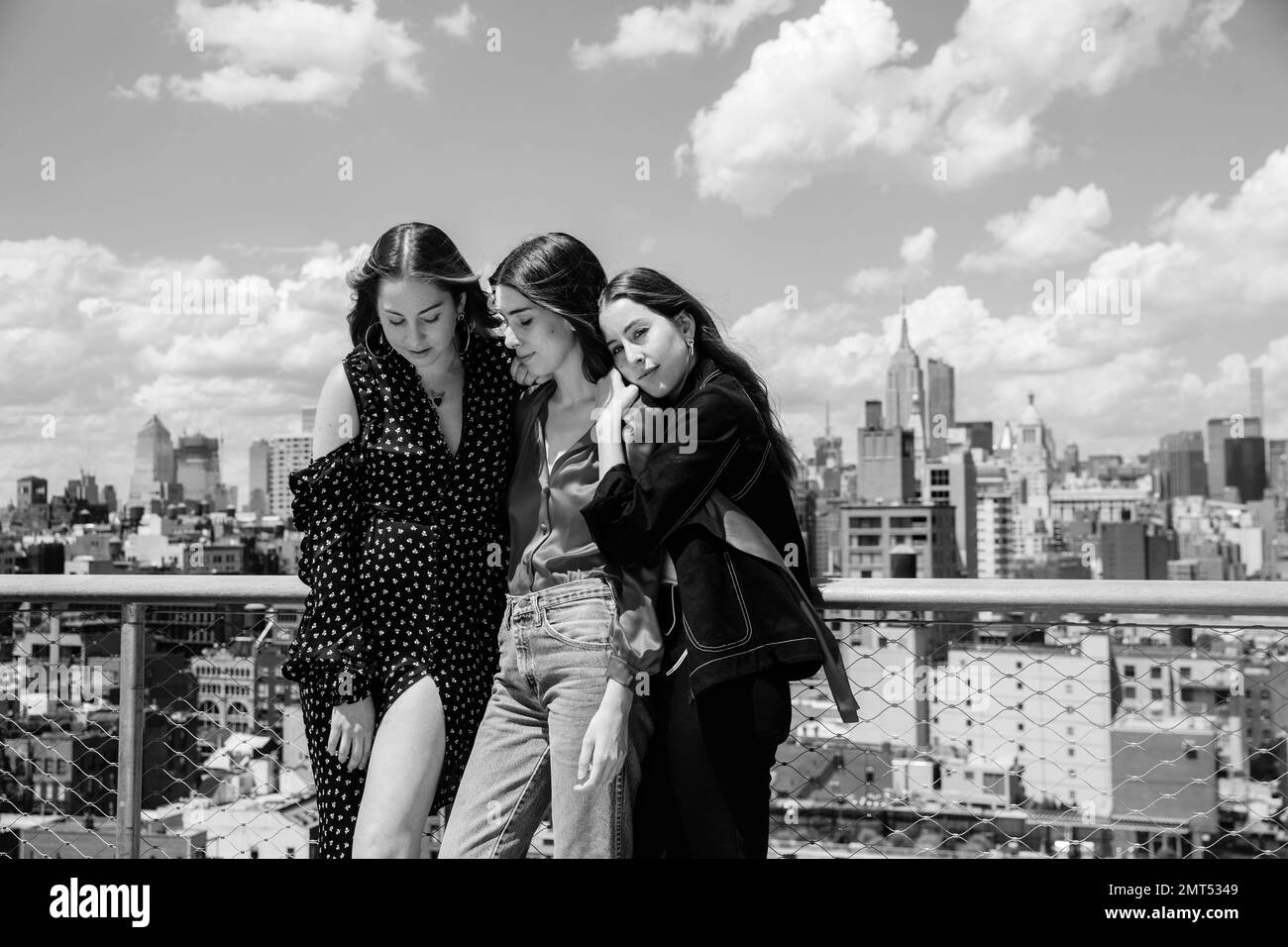In this June 27, 2017 photo, Este Haim, from left, Danielle Haim and Alana Haim of Haim pose for ...