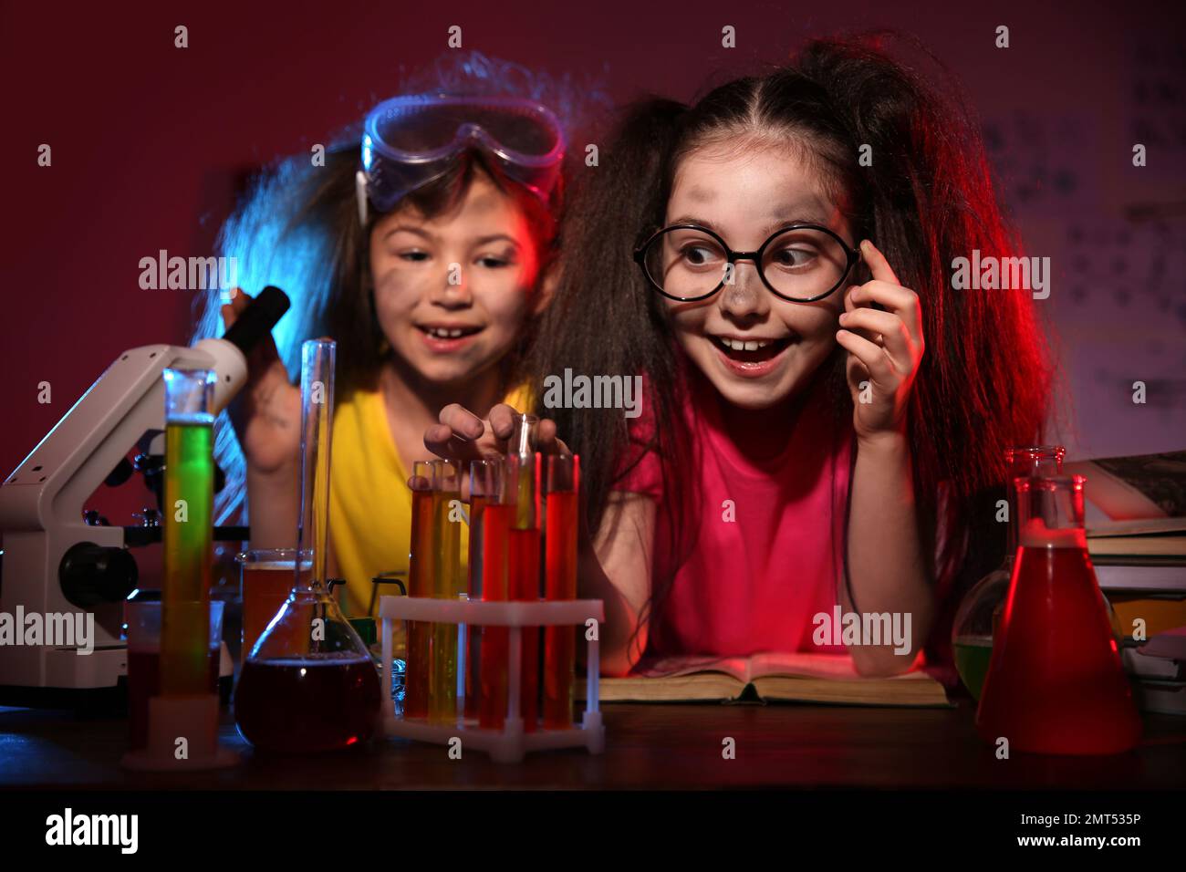 Children doing chemical research in laboratory. Dangerous experiment ...