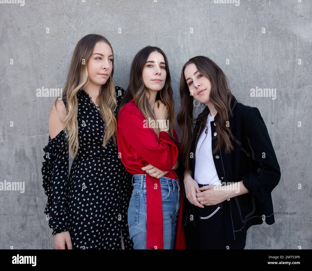 In this June 27, 2017 photo, Este Haim, from left, Danielle Haim and ...