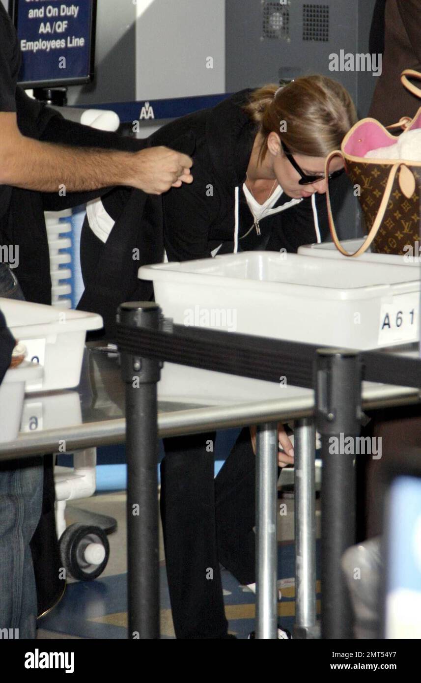 Nicky Hilton and boyfriend David Katzenberg head through the security ...
