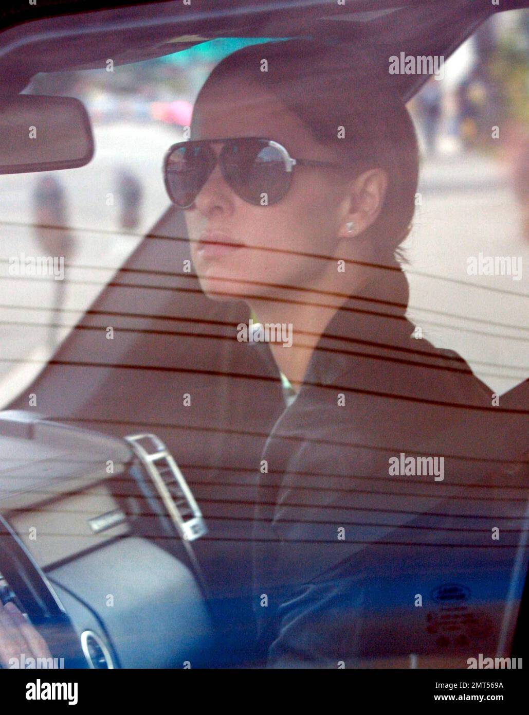 Nicky Hilton, dressed casually in a black jacket, black top and blue ...