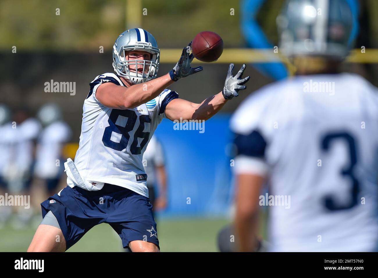 Dallas Cowboys tight end Connor Hamlett reaches out for the ball as ...