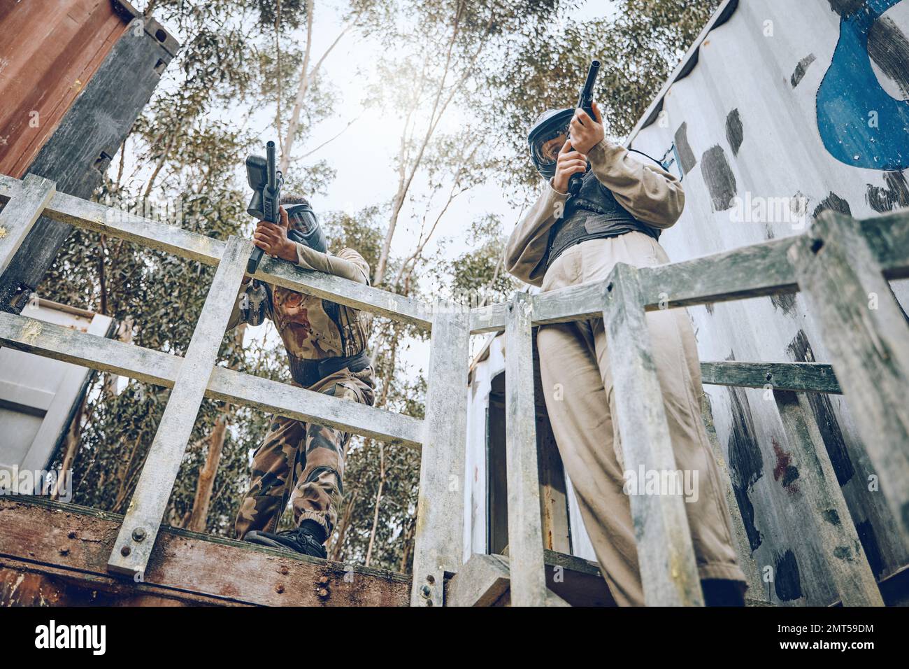 Paintball, teamwork people and gun target, shooting and games in war ...