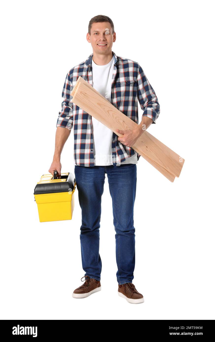Handsome carpenter with wooden planks and tool box isolated on white ...