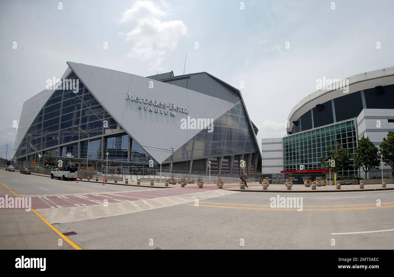 Mercedes Benz Stadium, left, the new home of the Atlanta Falcons ...