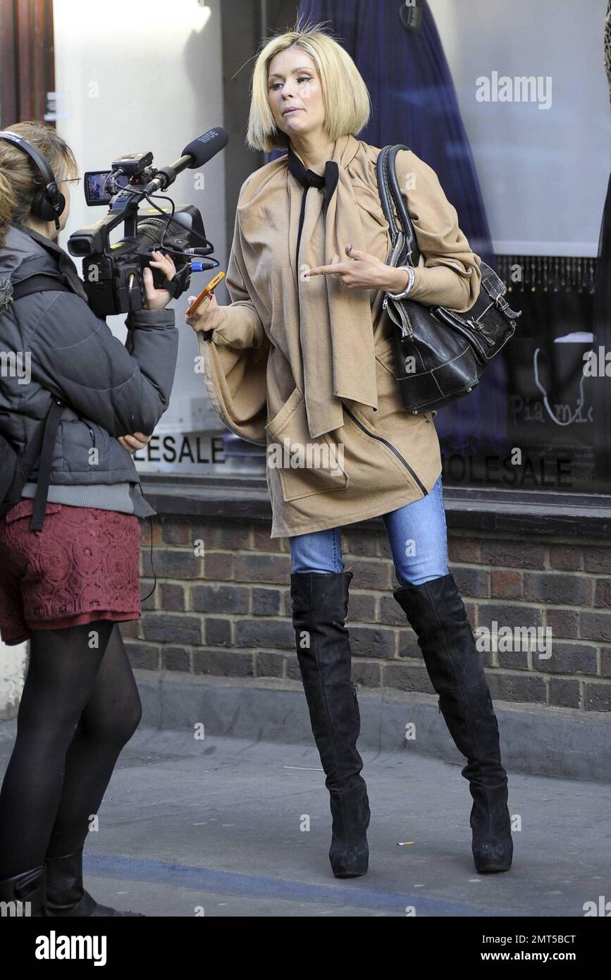 Model and WAG Nicola McLean films on the streets of London with a ...