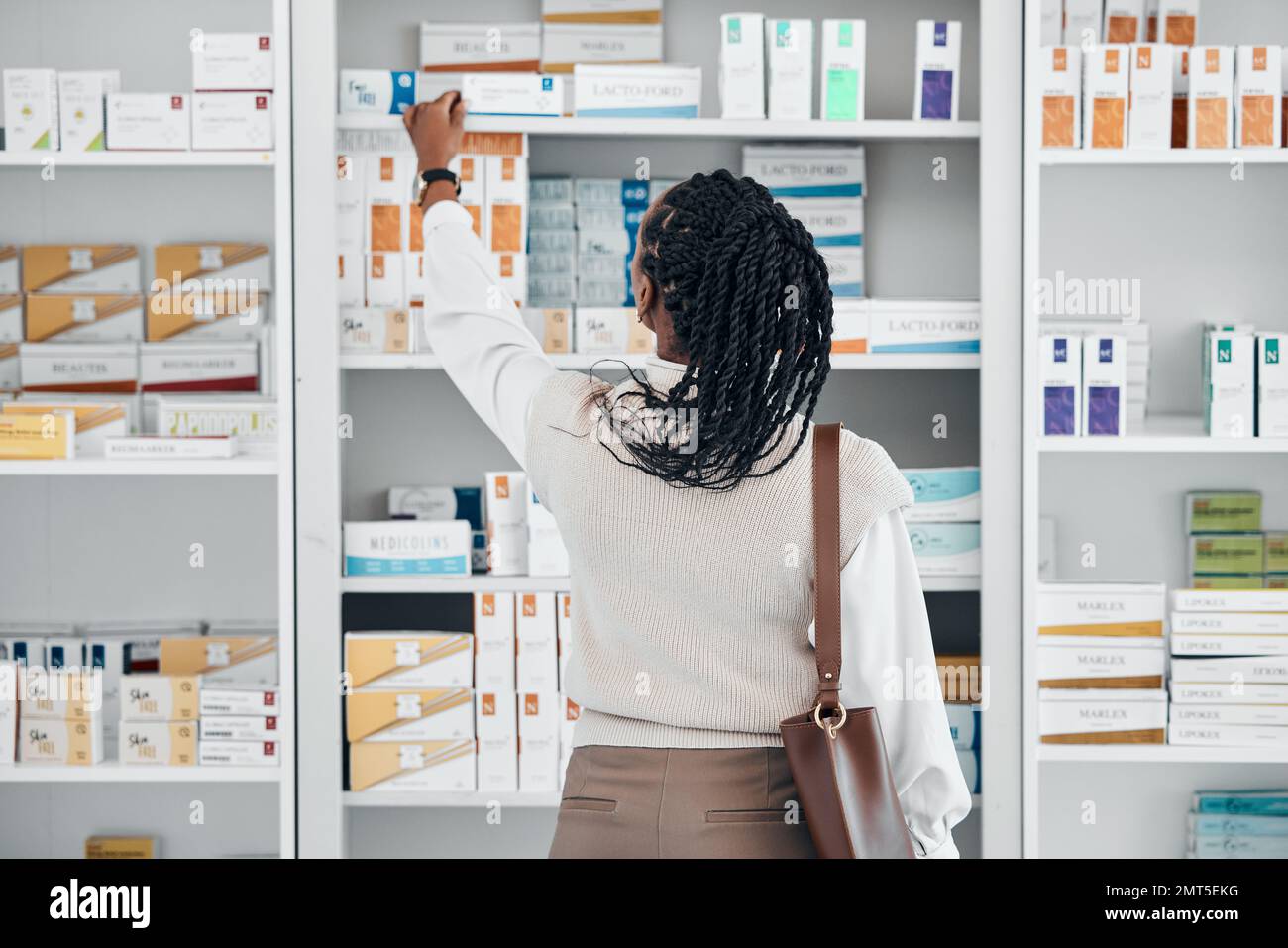 Woman buying glasses in pharmacy hi-res stock photography and images ...