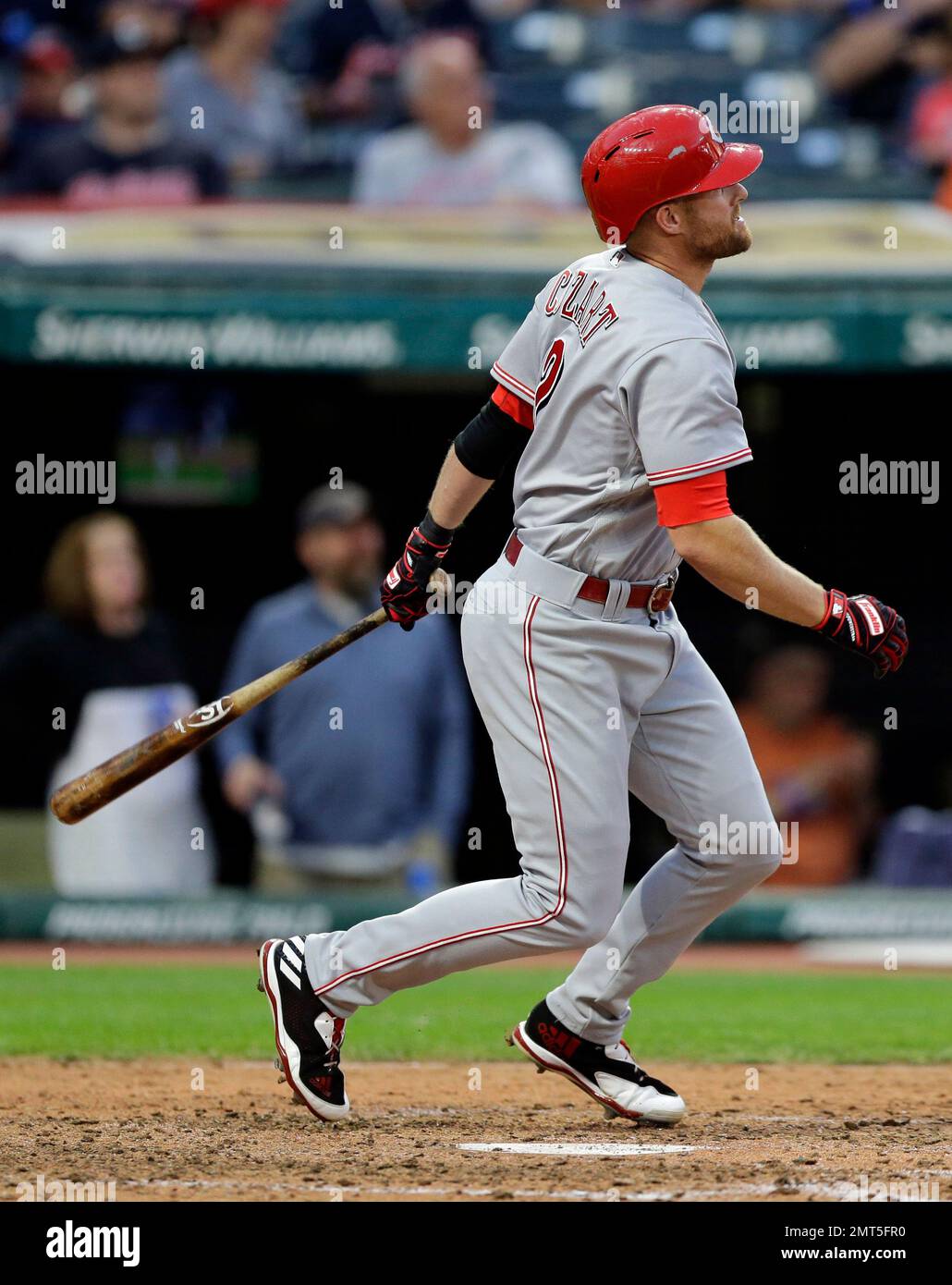 Cincinnati Reds shortstop Zack Cozart watches his solo home run off ...
