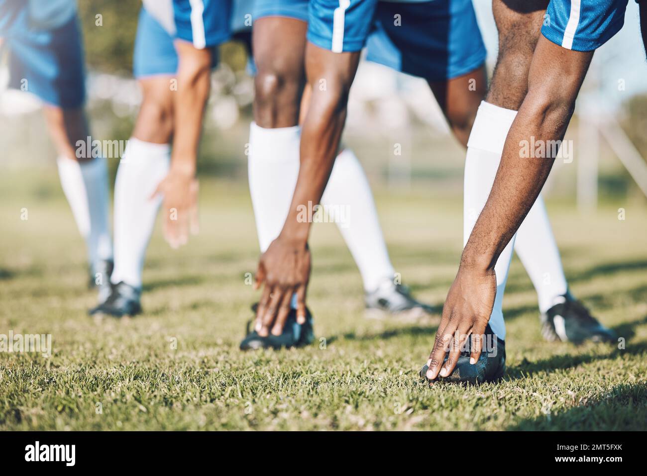 Young players stretching hi-res stock photography and images - Alamy
