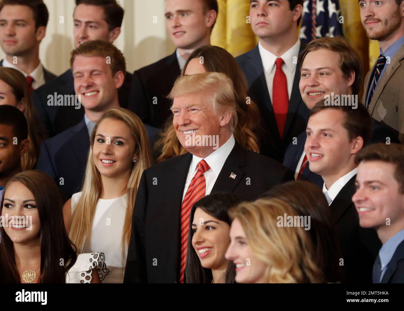 President Donald Trump poses for a photo with outgoing White House ...