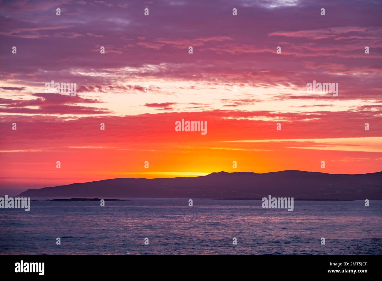 Sunset above Aran Island - Arranmore - County Donegal, Ireland Stock ...