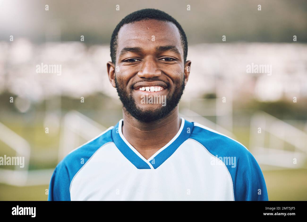 Sports, smile and portrait of soccer player on field with happy face ...