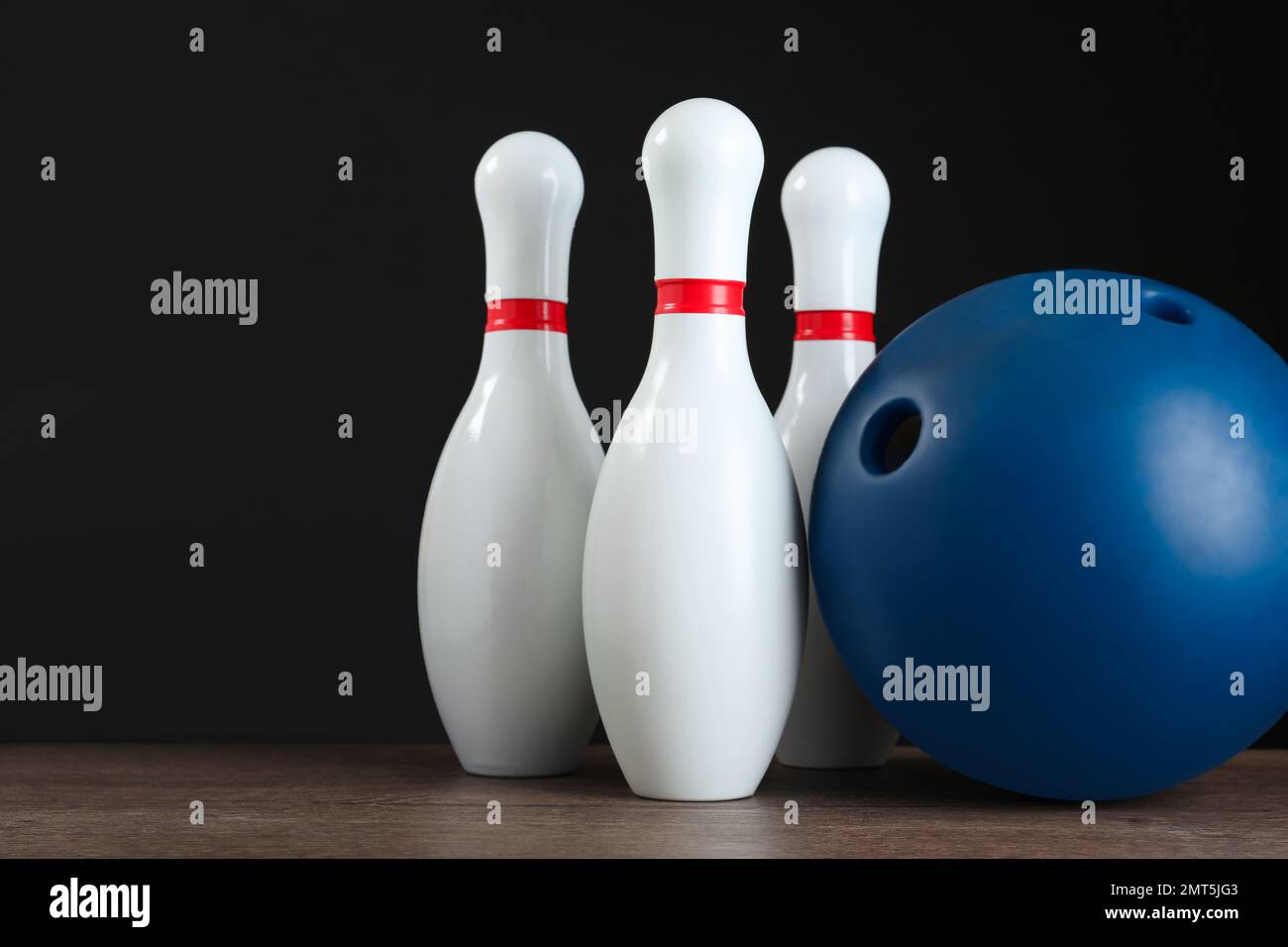 Wooden bowling pins hi-res stock photography and images - Alamy