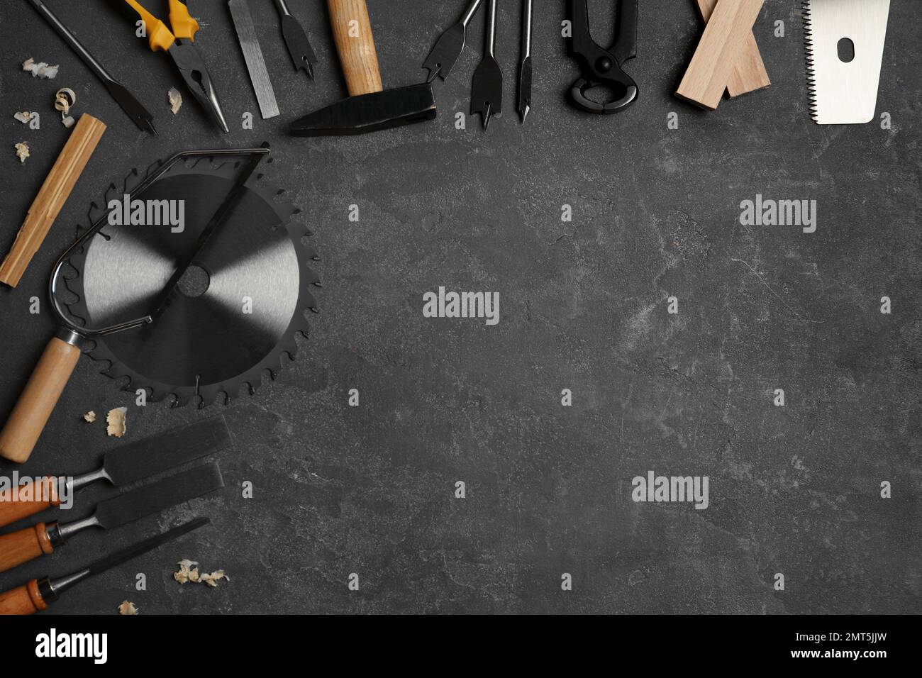 Flat lay composition with carpenter's tools on grey background. Space ...