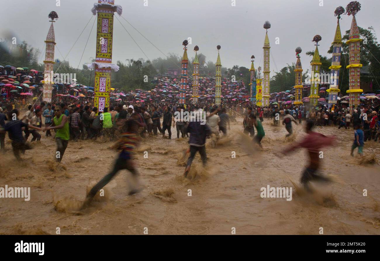 Indian Pnar or Jaintia tribesmen carry 'Rongs' or chariots and dance in ...