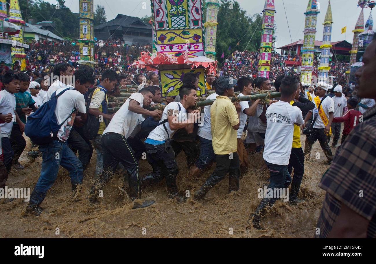 Indian Pnar or Jaintia tribesmen carry 'Rongs' or chariots through ...