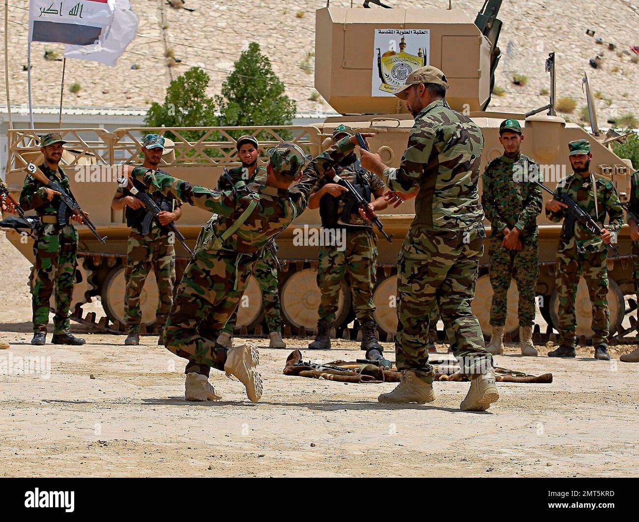 In this Tuesday, July 18, 2017 photo, Shiite Volunteers fighters of the ...