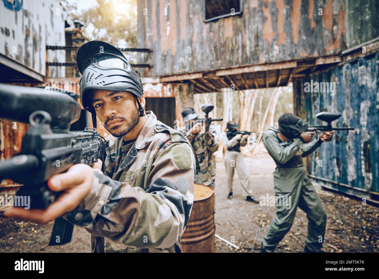 Paintball, teamwork and soldier group together for military, army and ...