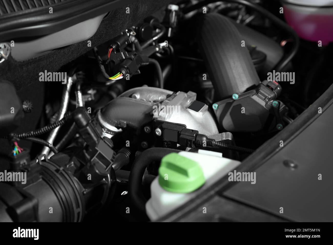 Closeup view of engine bay in modern car Stock Photo - Alamy