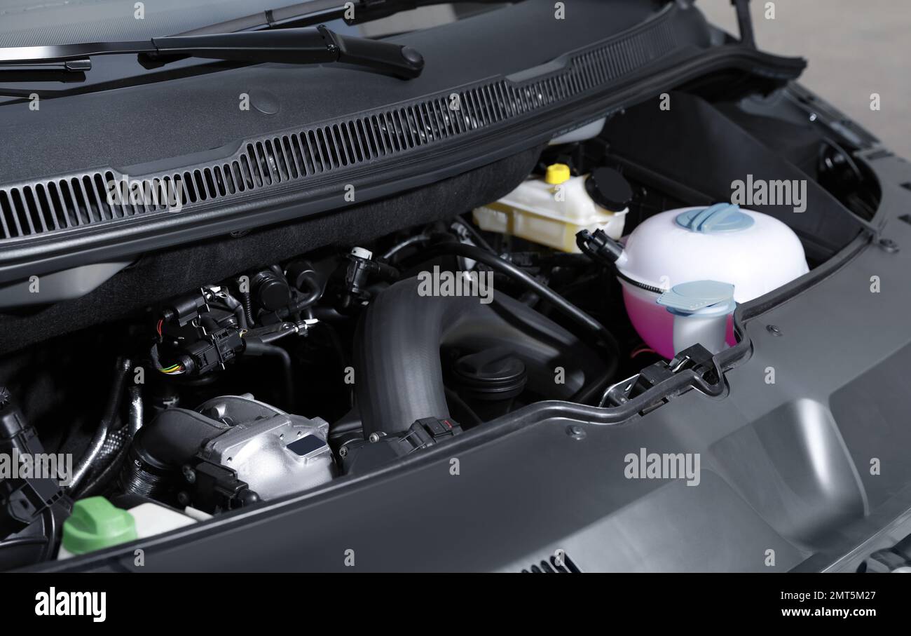 Closeup view of engine bay in modern car Stock Photo - Alamy