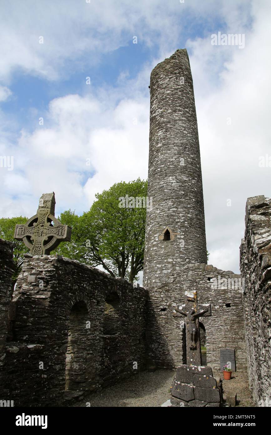 Irish round tower in the ruins of Monasterboice in Ireland Stock Photo ...
