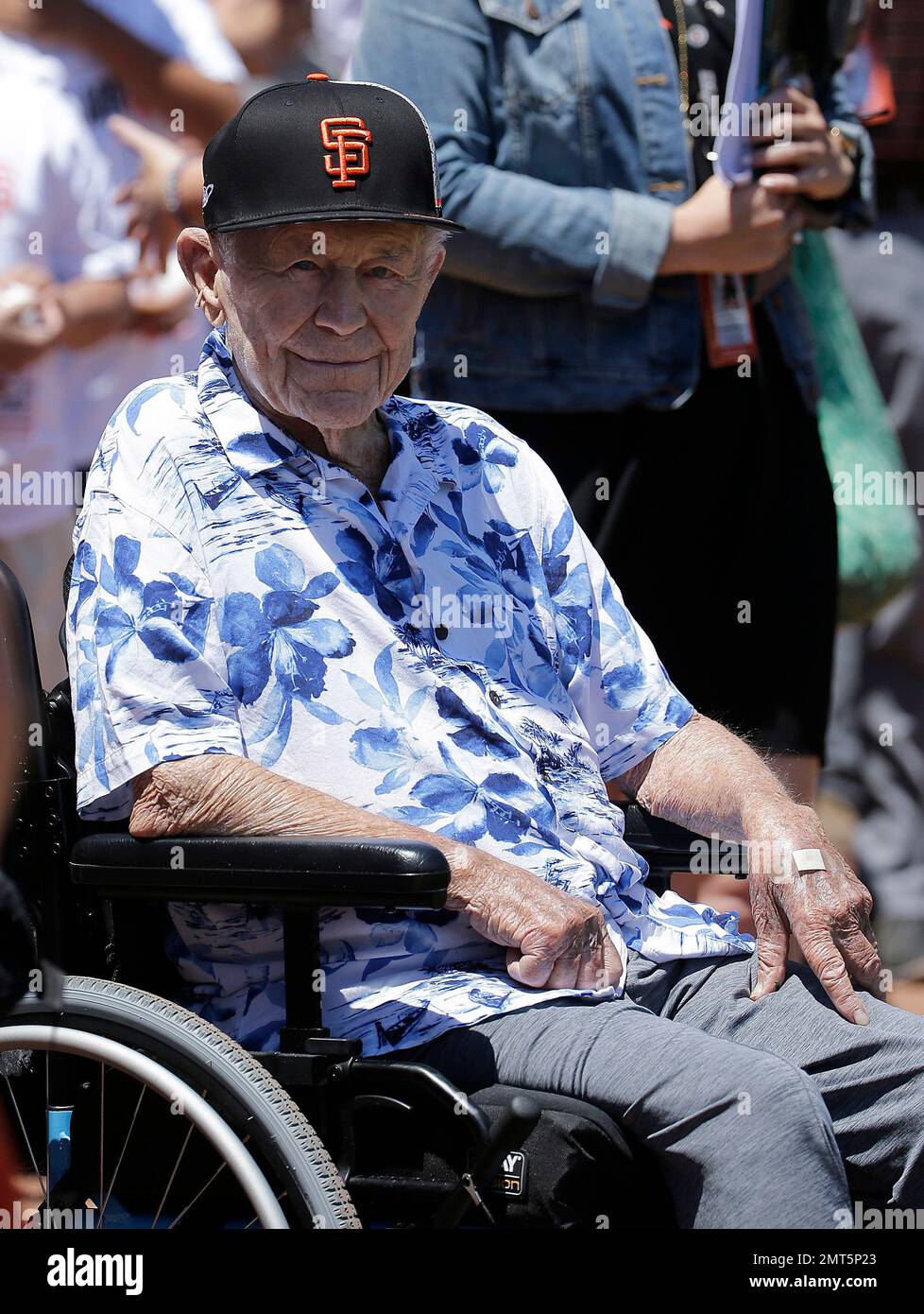 Gen. Chuck Yeager is shown on the field before a baseball game between ...
