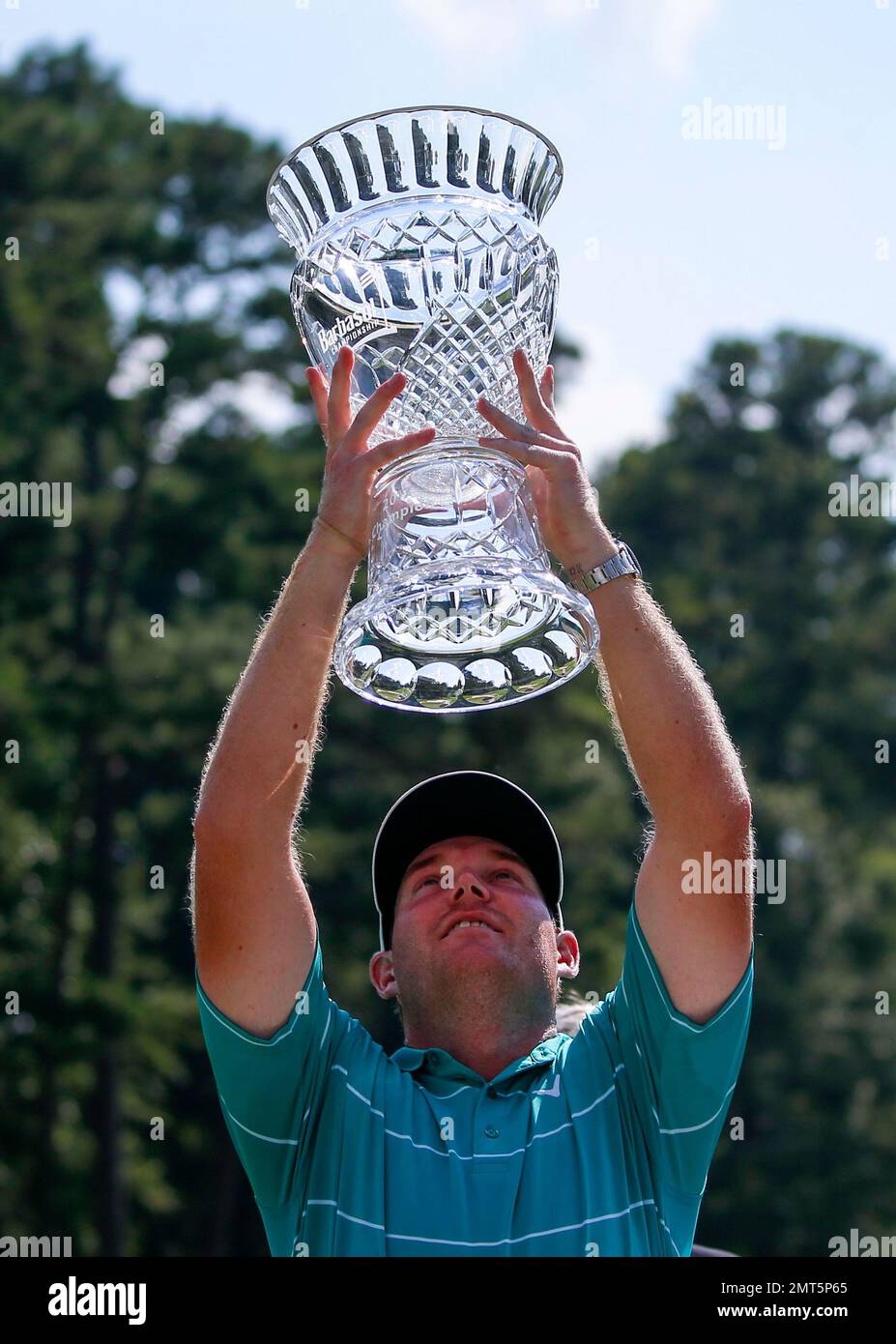 Grayson Murray hoist the trophy after winning the Barbasol Championship ...