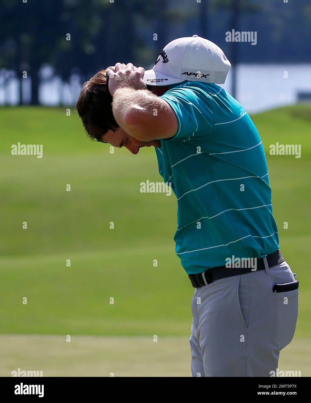 Grayson Murray reacts after making a putt on the 18th green and winning ...
